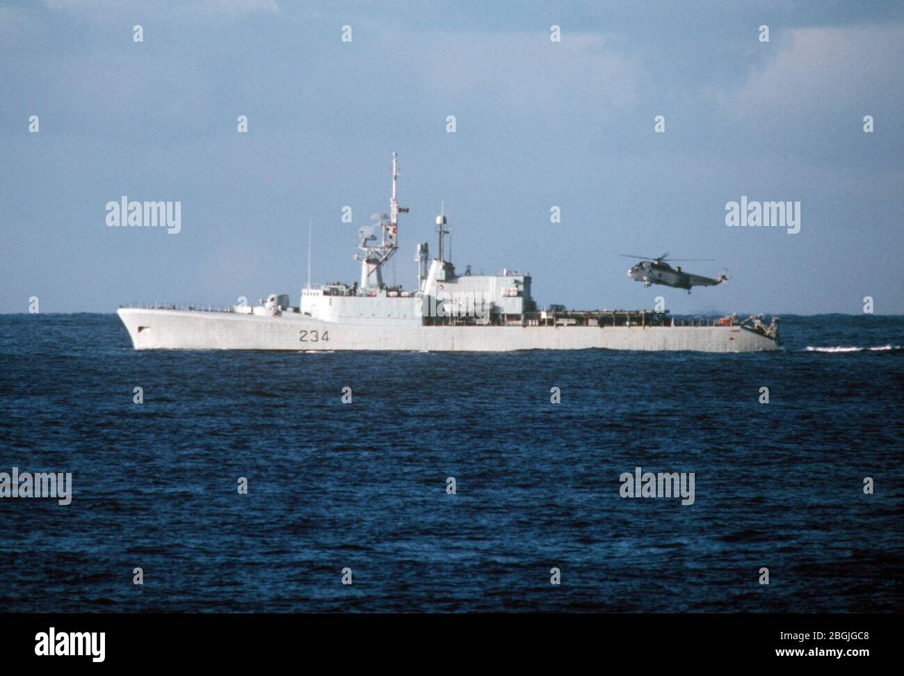 HMCS Assiniboine (DDH 234) with Sea King in 1986 Stock Photo - Alamy