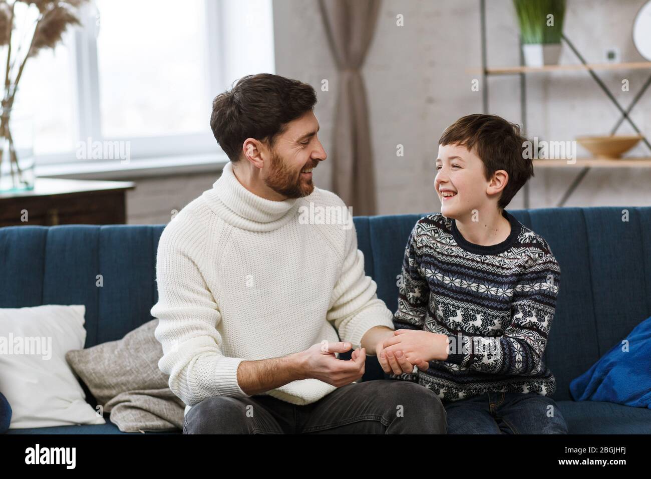 Spending time together. Young father with his little son. Cute boy with ...