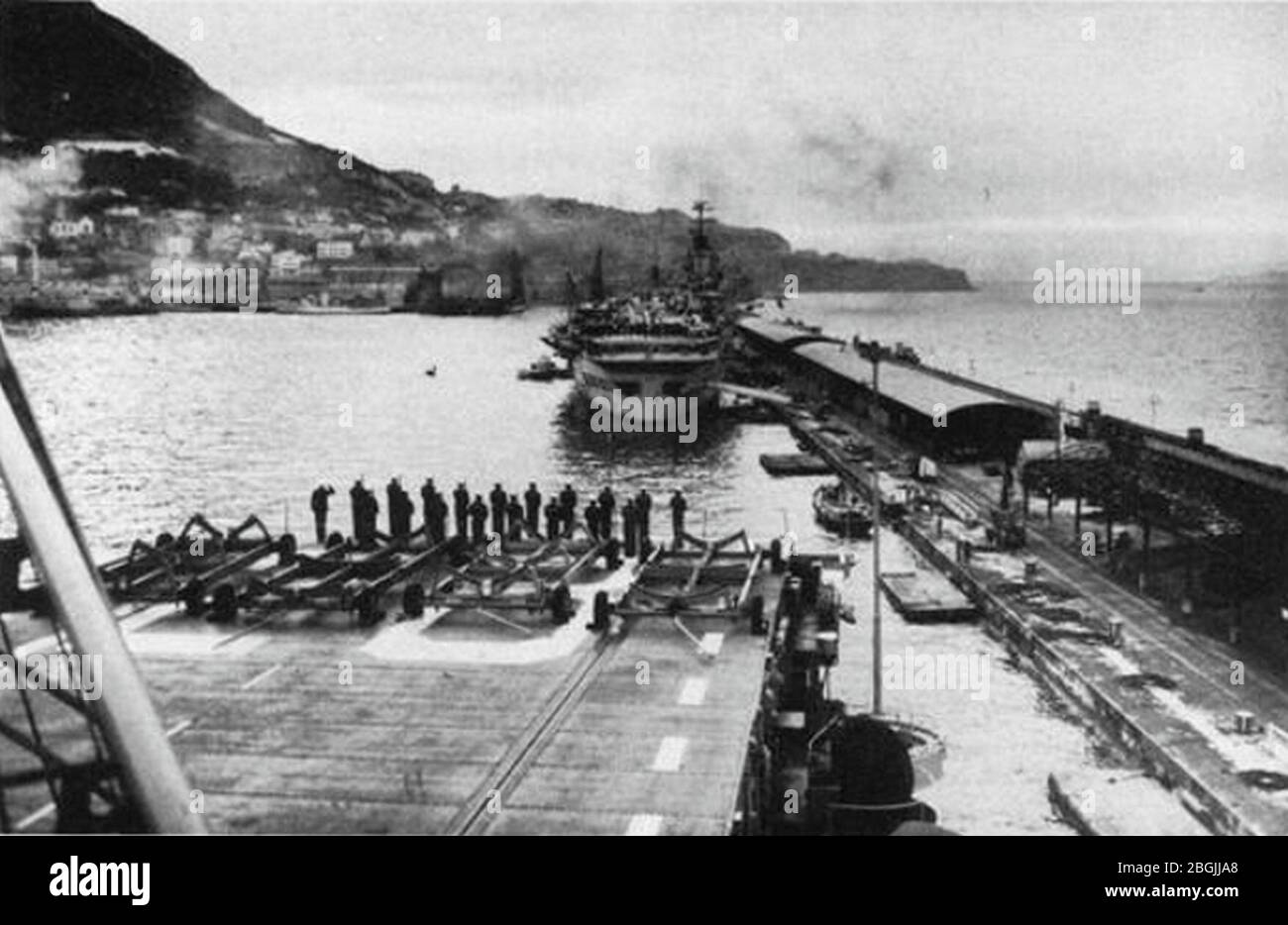 HMS Indomitable (92) and USS Cabot (CVL-28) at Gibraltar in early 1952 ...