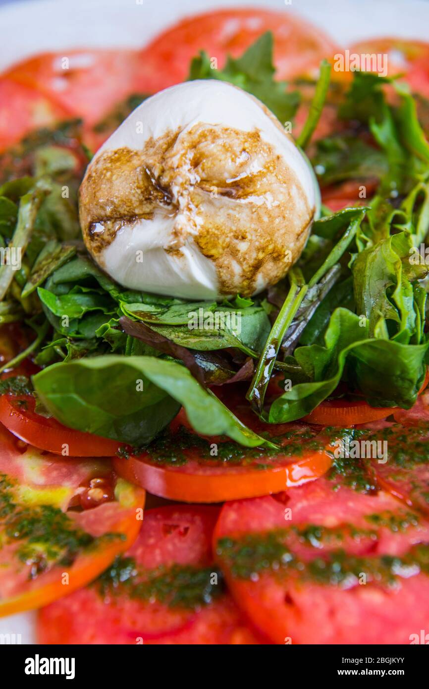 traditional Italian Caprese salad with mozzarella and tomatoes Stock ...