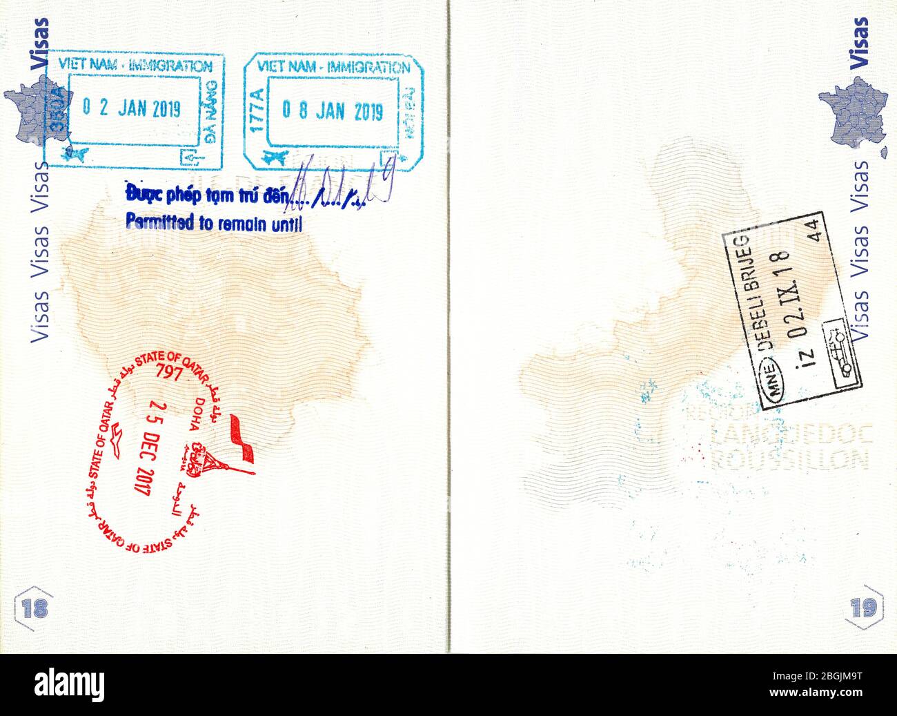 Stamps of Vietnam, Qatar and Montenegro in a French passport Stock ...