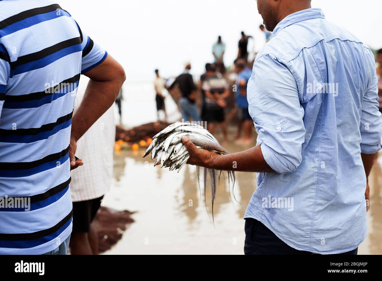 Holds fish hi-res stock photography and images - Alamy