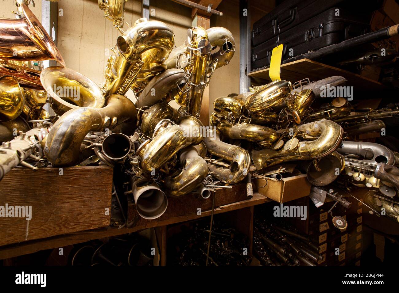 Instruments in a music repair shop Stock Photo - Alamy