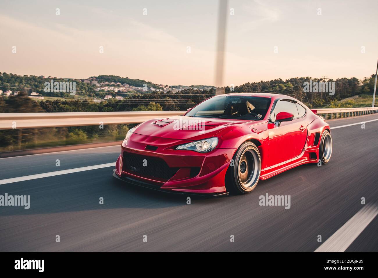 Luxury car front view on road hi-res stock photography and images - Alamy