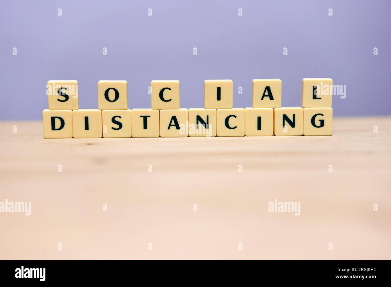 Social distancing message written with puzzle letters Stock Photo - Alamy