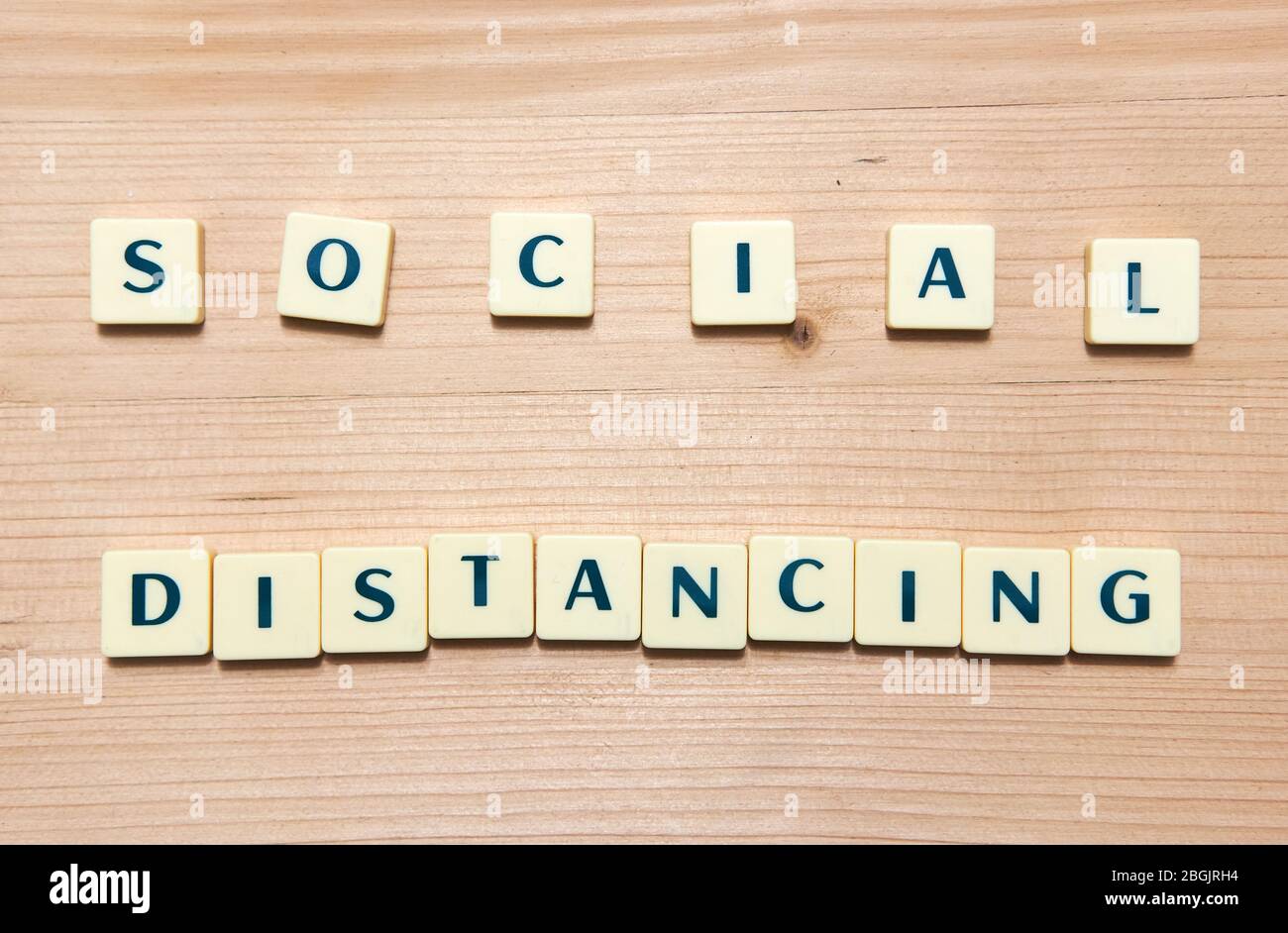 Social distancing message written with puzzle letters Stock Photo - Alamy
