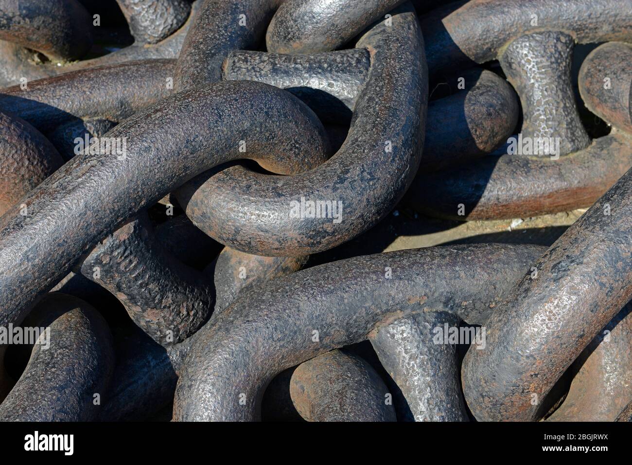 Preserved ship chain links on Butlers wharf near Tower Bridge in London ...