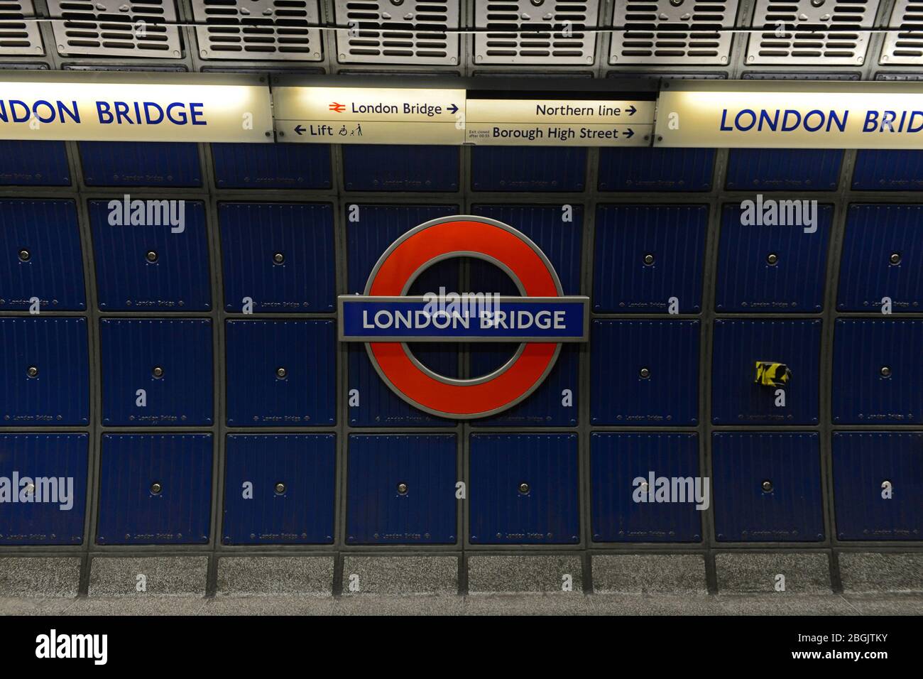London bridge station name as the tfl logo at the underground station ...