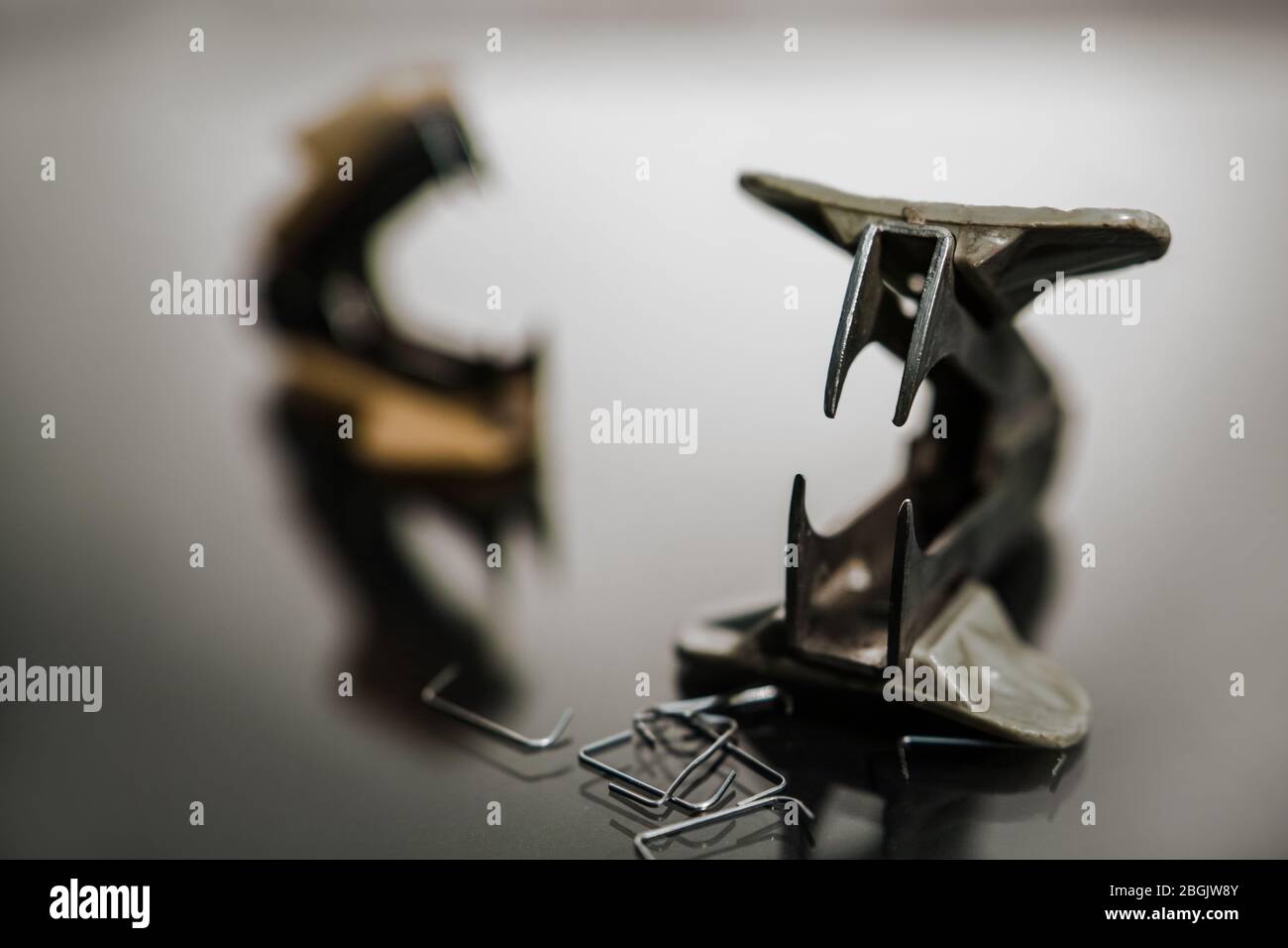 Staple removers that look like predatory monsters ... next to their ...
