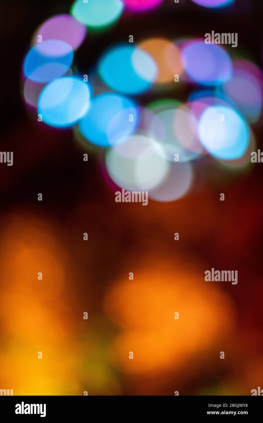 Colorful bokeh lights at night with a warm background Stock Photo - Alamy
