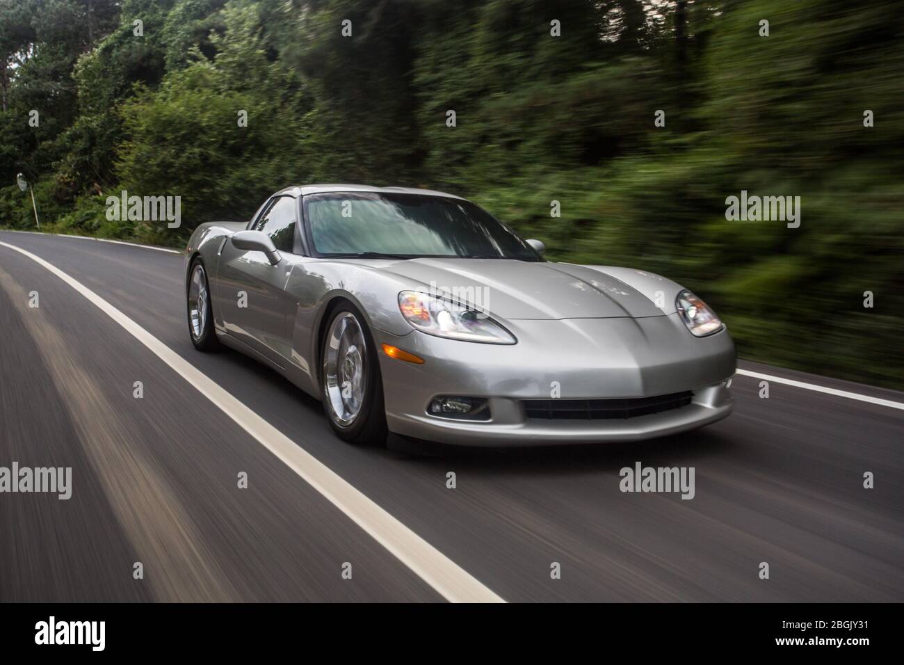 Silver supercar speed performance test Stock Photo - Alamy