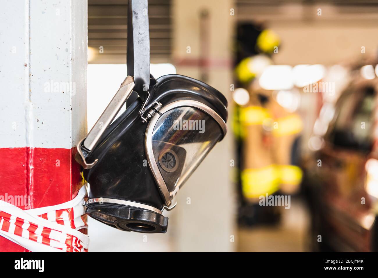 Gas mask of firefighters to protect themselves, hanging from the wall ...