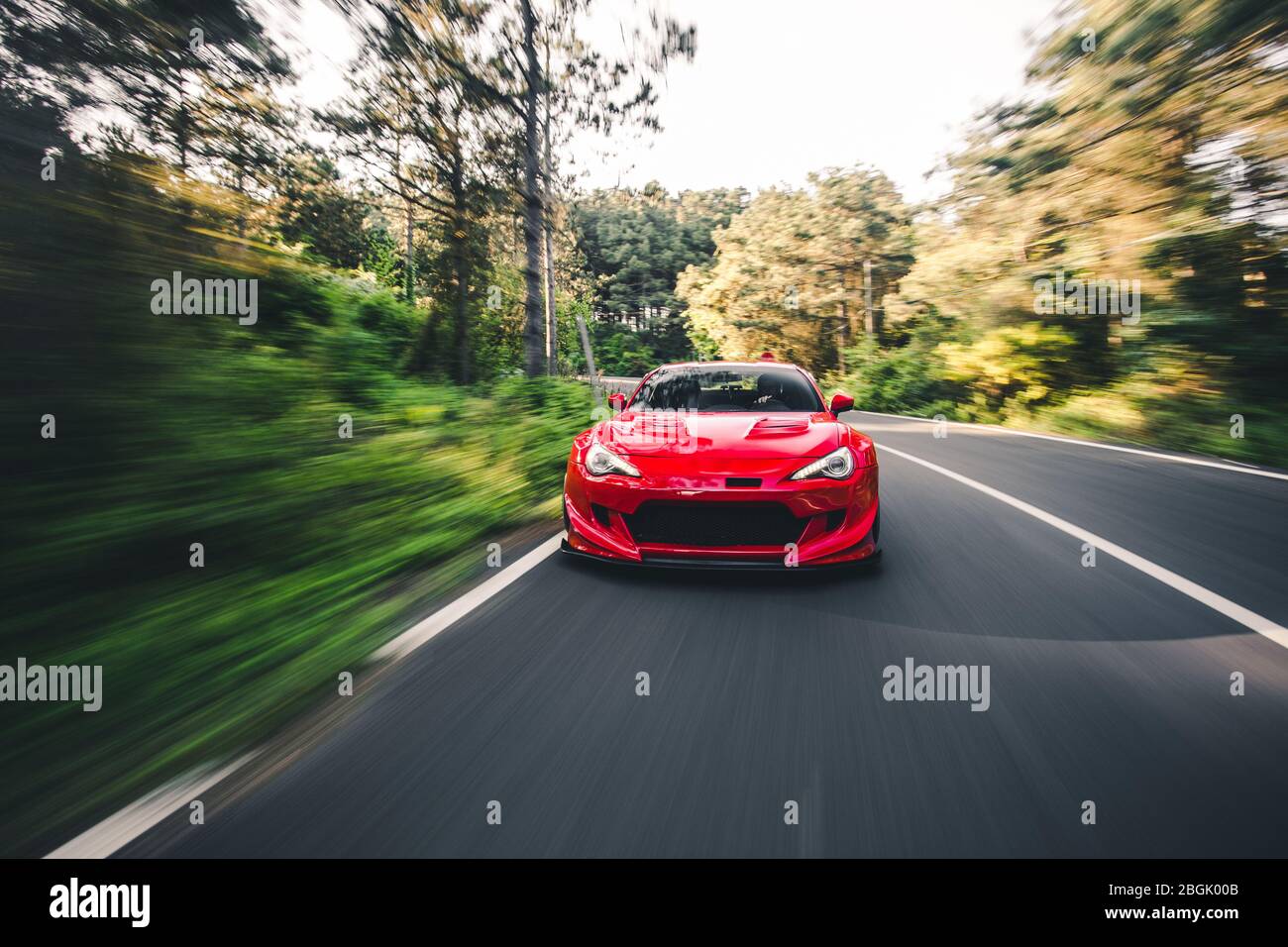 Red car road hi-res stock photography and images - Alamy