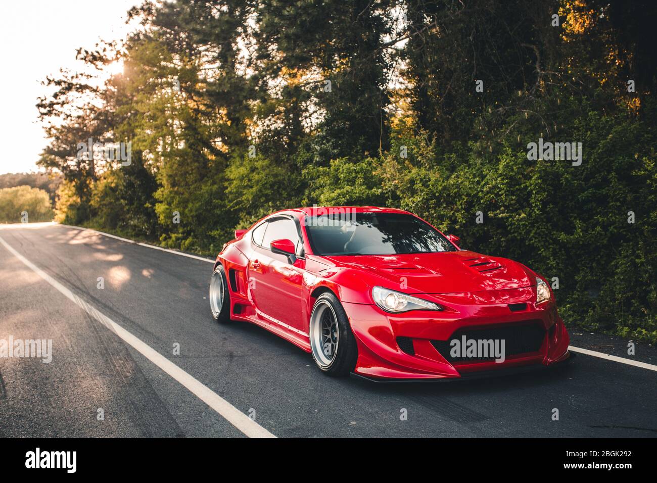 Test drive of red super sport model cars Stock Photo - Alamy