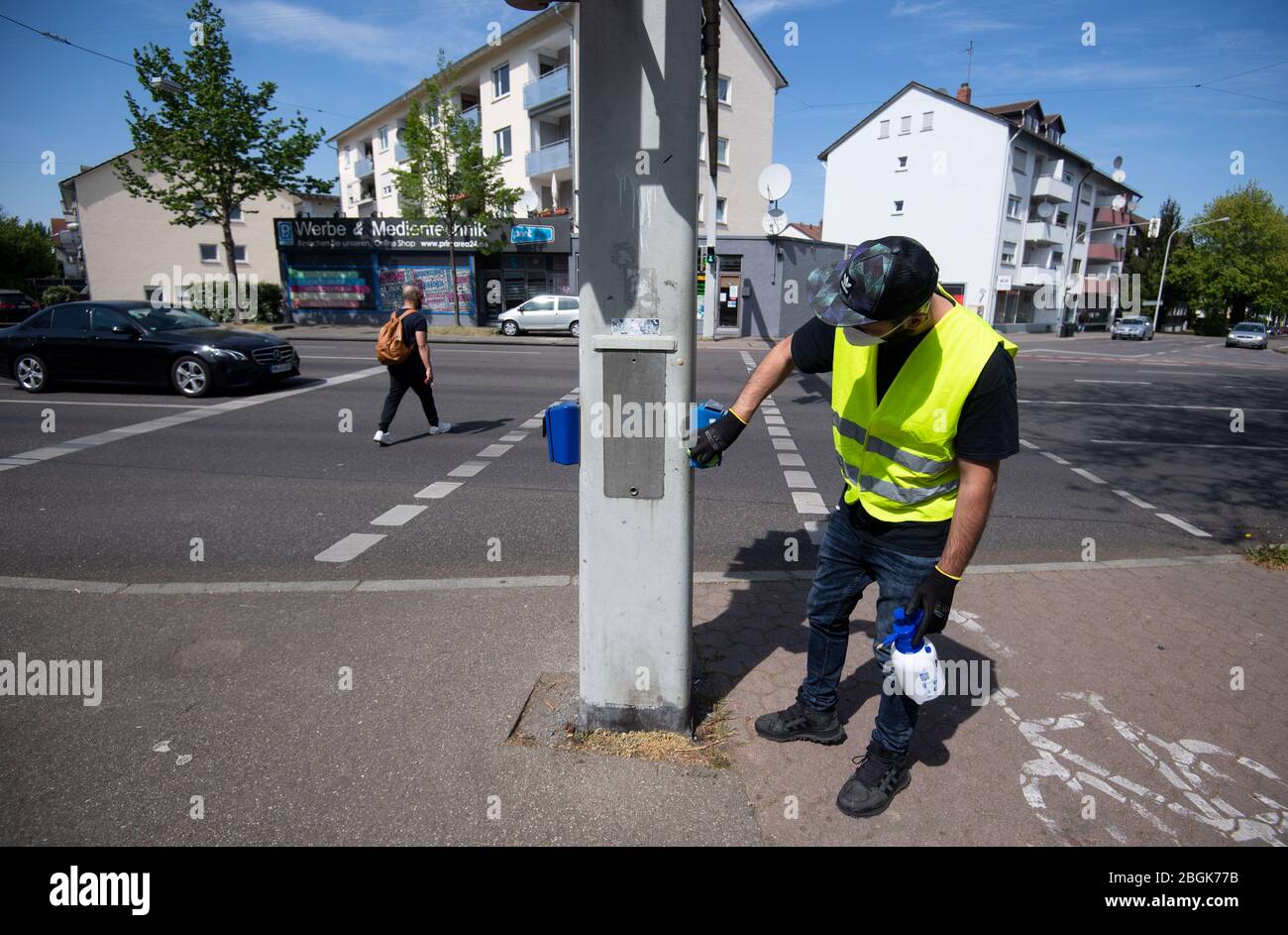 Heilbronn, Germany. 16th Apr, 2020. An employee of a cleaning company ...