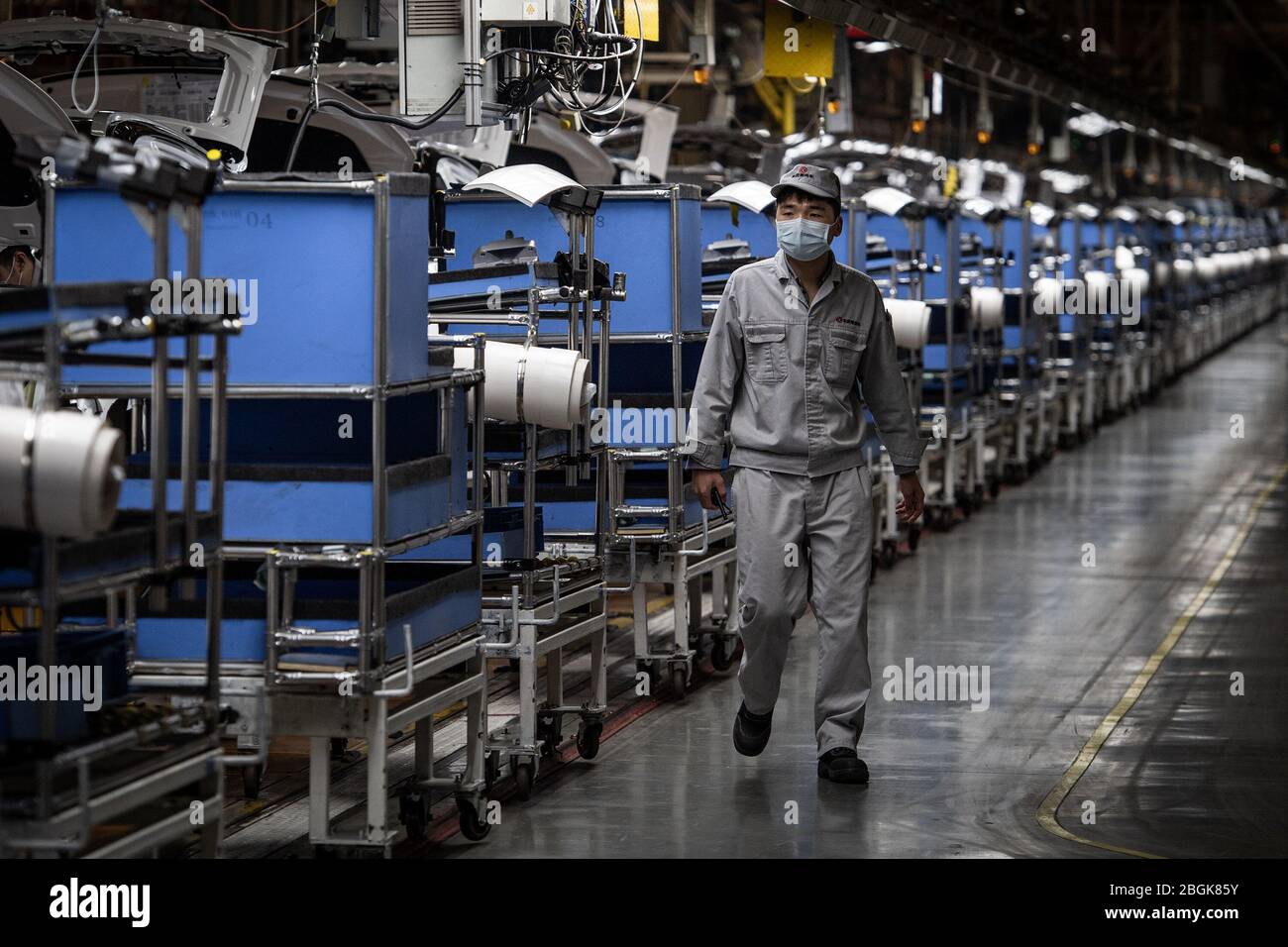 Staff of a local factory owned by Honda Motor Company, a Japanese ...
