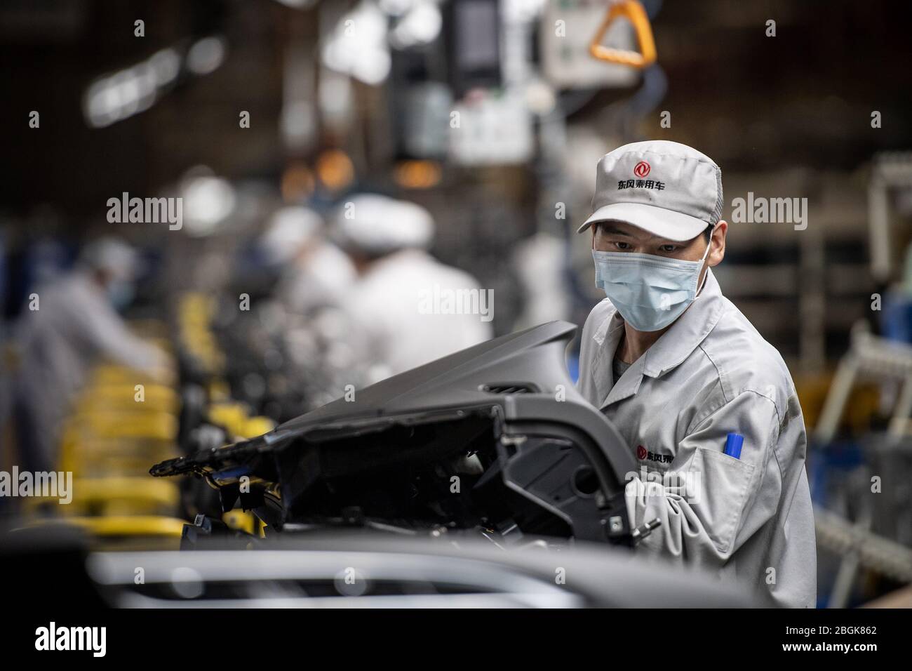 Staff of a local factory owned by Honda Motor Company, a Japanese ...