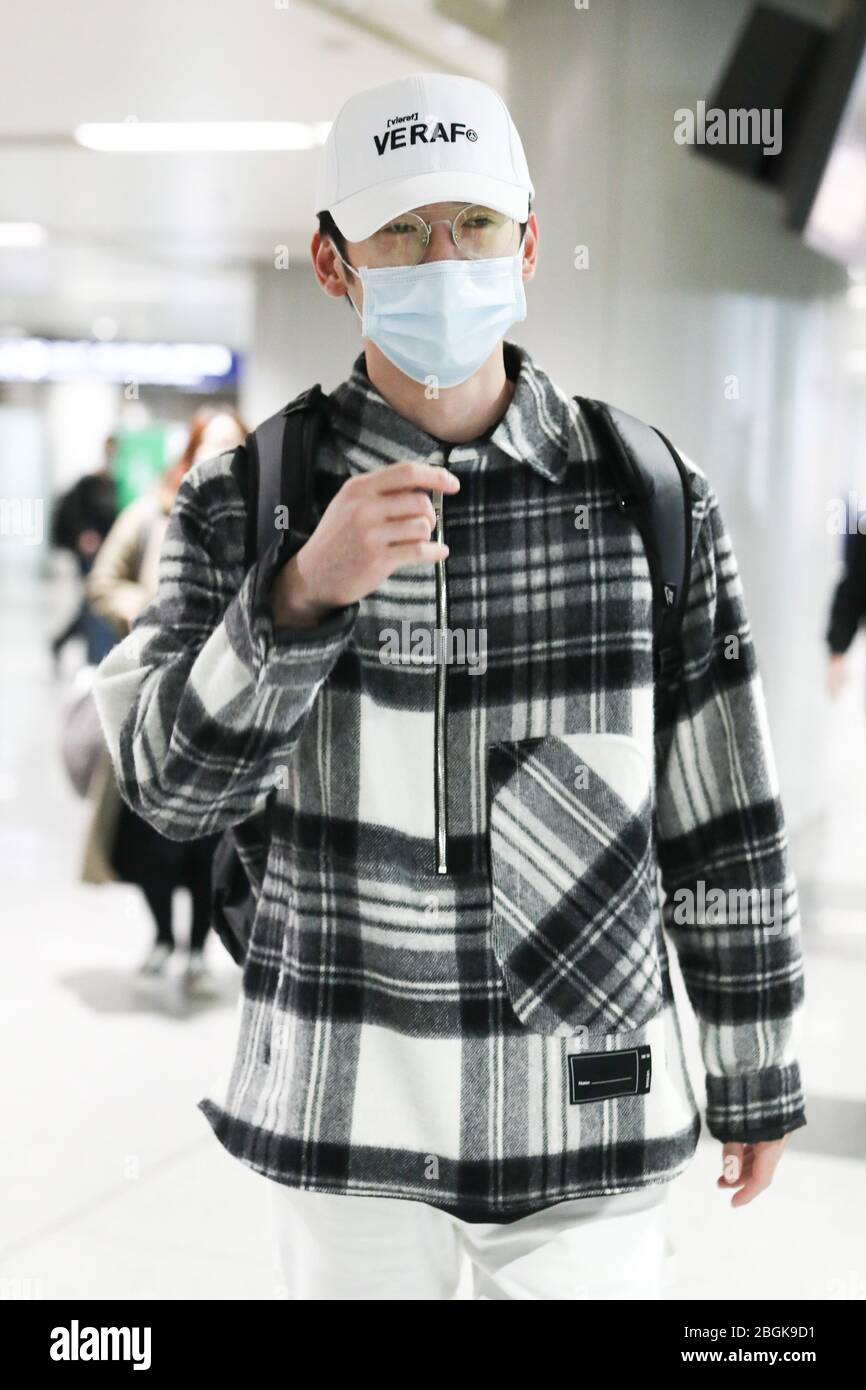 Chinese actor Liu Ruilin arrives at a Beijing airport before departure ...