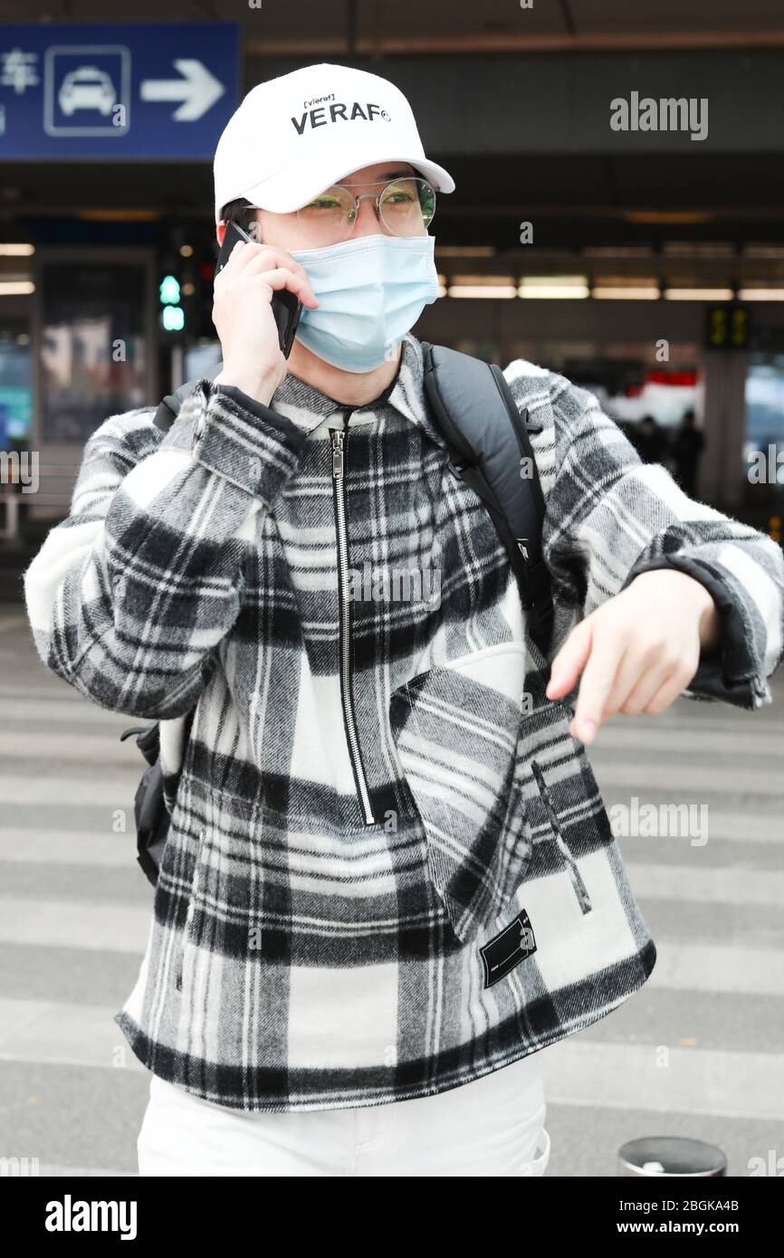 Chinese actor Liu Ruilin arrives at a Beijing airport before departure ...