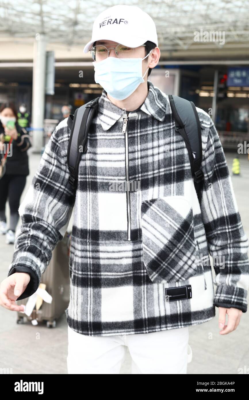 Chinese actor Liu Ruilin arrives at a Beijing airport before departure ...
