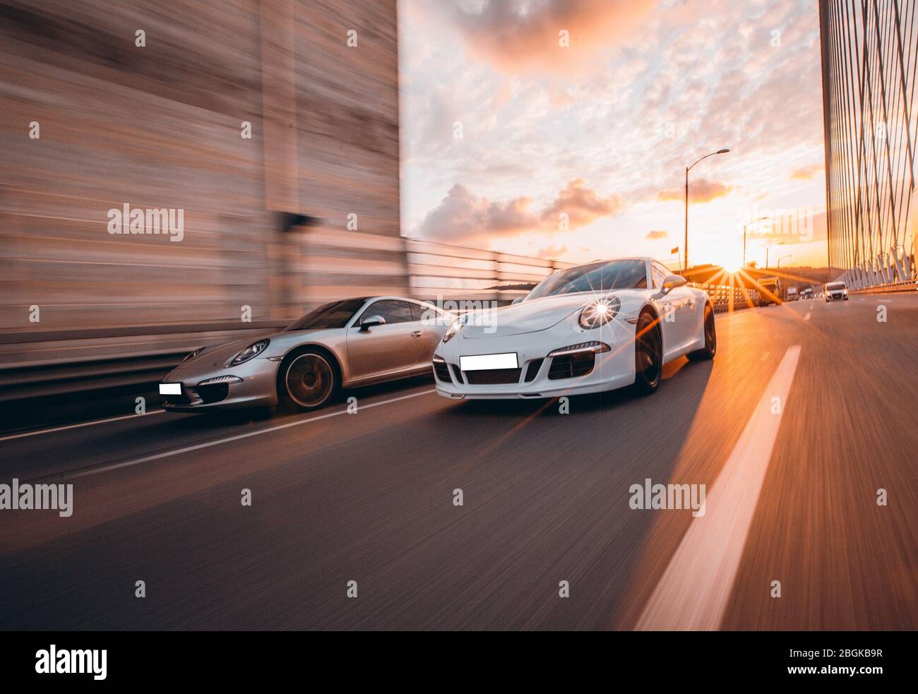 Speed motion between two sport cars in the tunnel Stock Photo - Alamy