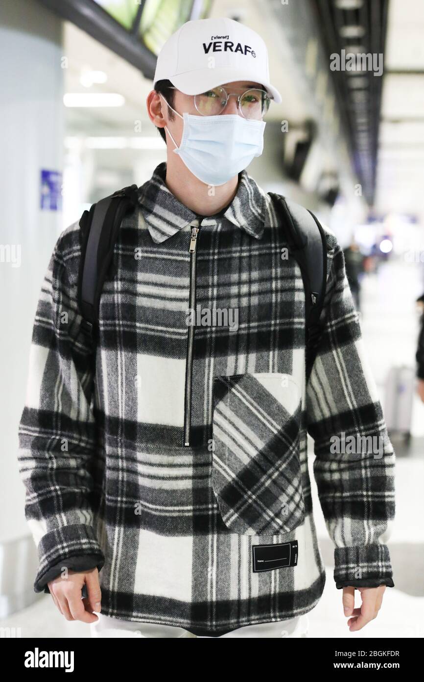 Chinese actor Liu Ruilin arrives at a Beijing airport before departure ...