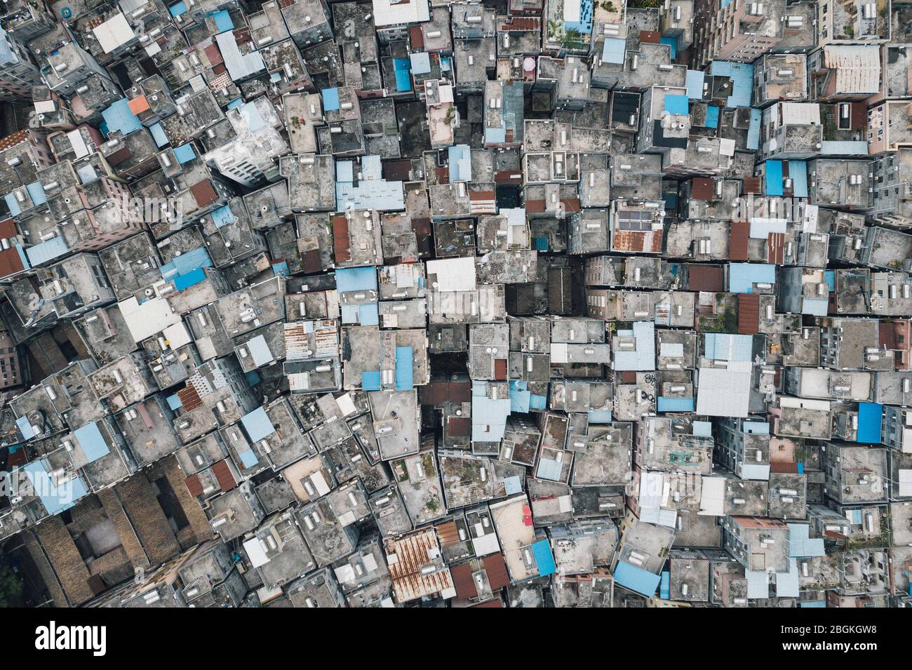 An aerial view of rows of resident buildings of various heights ...