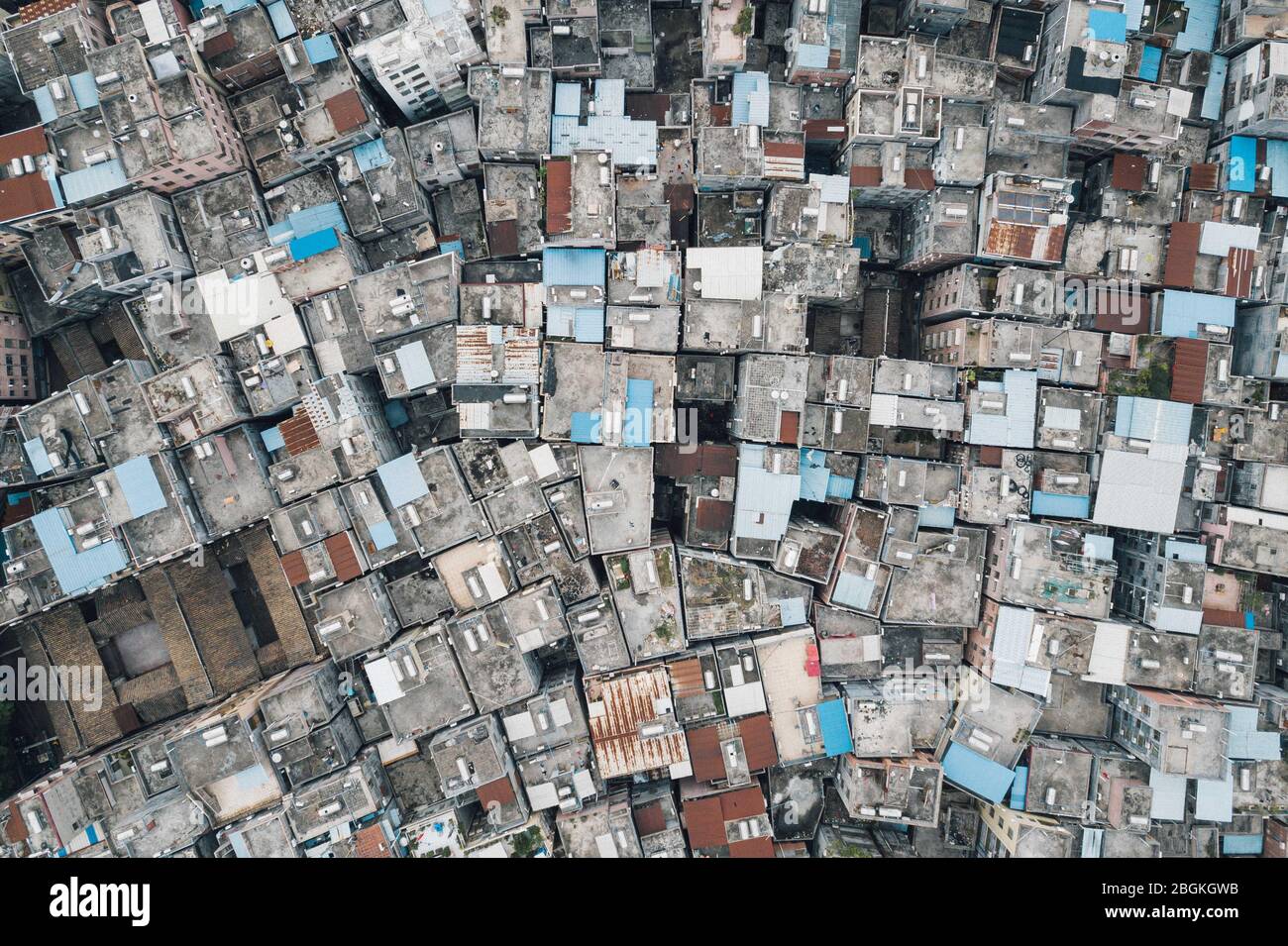 An aerial view of rows of resident buildings of various heights ...