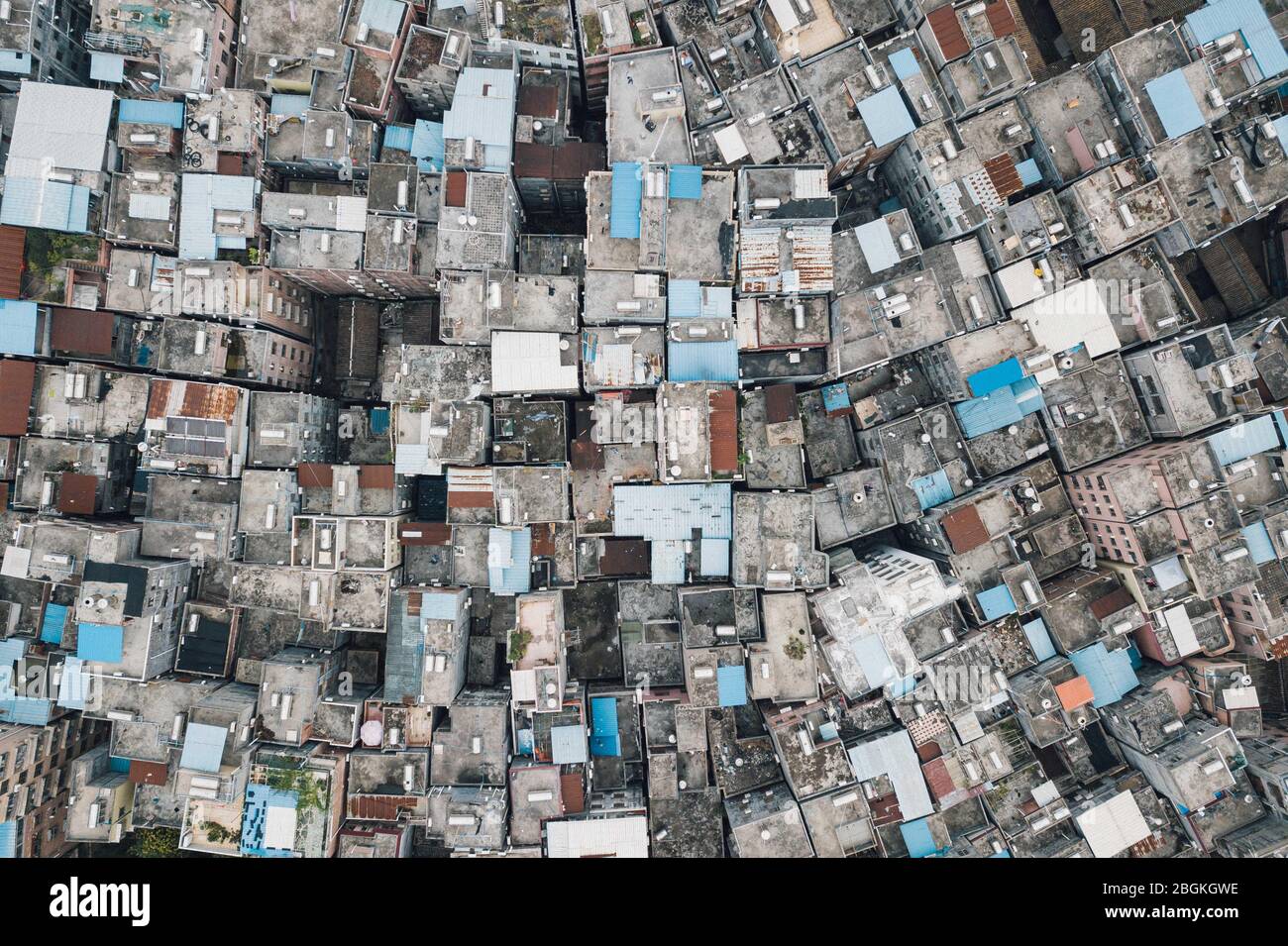 An aerial view of rows of resident buildings of various heights ...