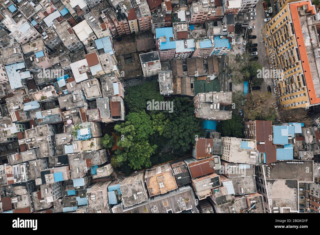 An aerial view of rows of resident buildings of various heights ...