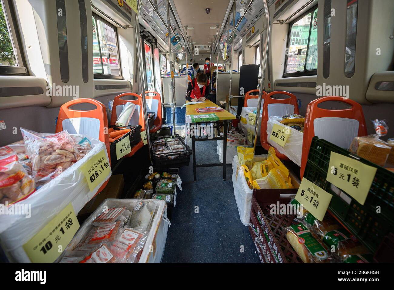 Goods are displayed in the bus supermarket which is a cooperation of ...