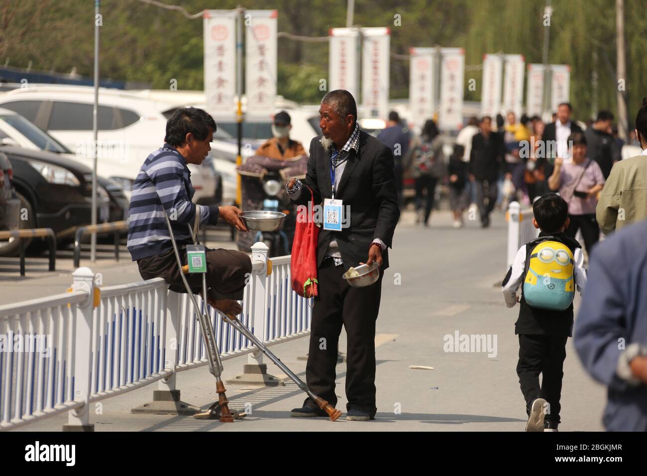 Two beggars hi-res stock photography and images - Alamy