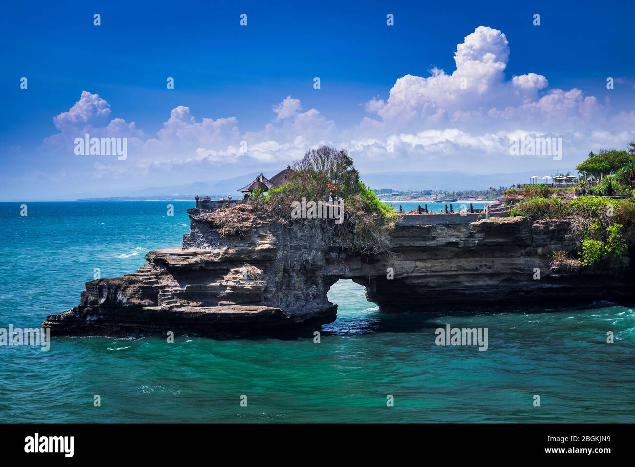 Sea arch at Tanah Lot Temple, Bali, Indonesia Stock Photo - Alamy