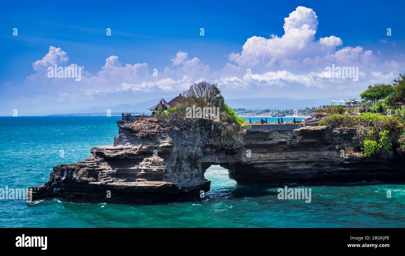 Sea arch at Tanah Lot Temple, Bali, Indonesia Stock Photo - Alamy
