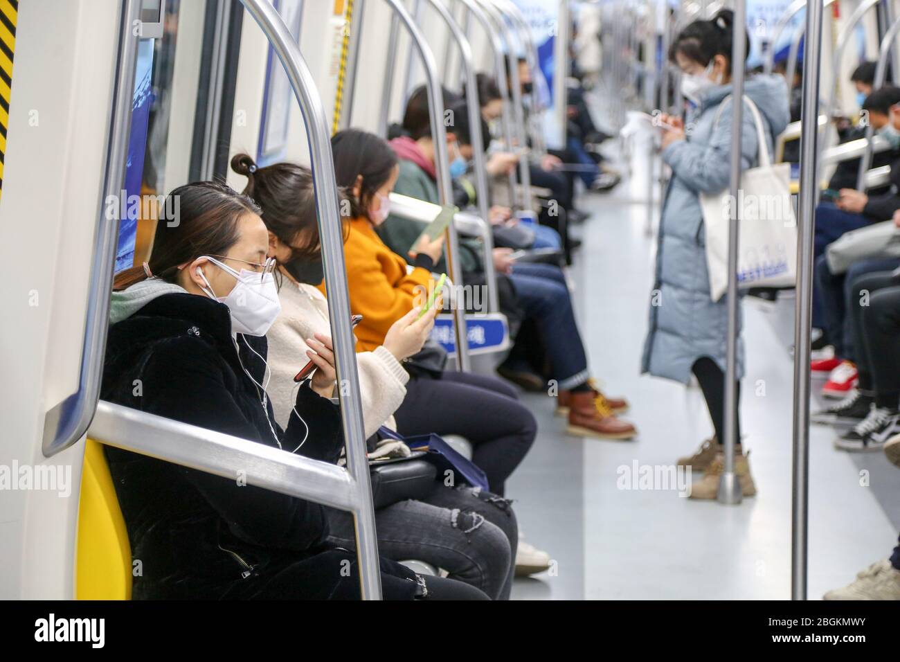 Passengers take subway to work during peak time of weekday commute ...