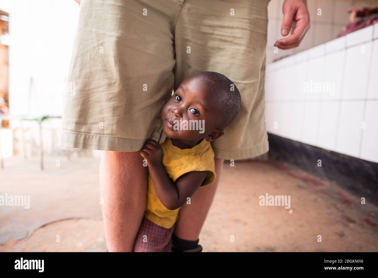 Shy child and legs hi-res stock photography and images - Alamy