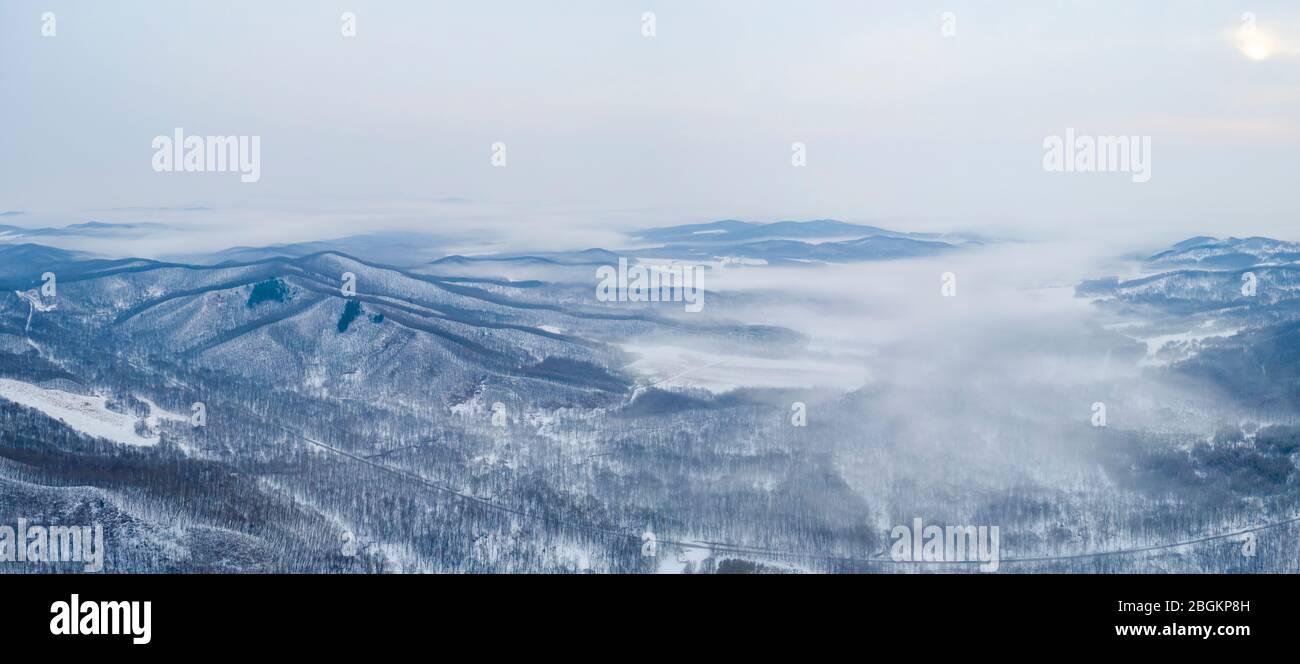 An aerial winter scenery of trees covered with rime around Xingkai Lake ...