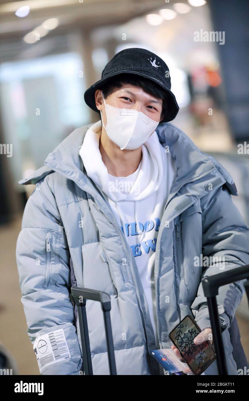 Chinese singer Charlie Zhou Shen arrives at a Shanghai airport after ...