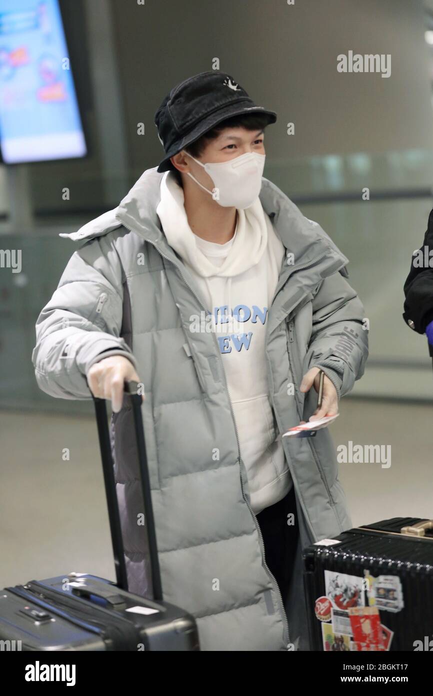 Chinese singer Charlie Zhou Shen arrives at a Shanghai airport after ...