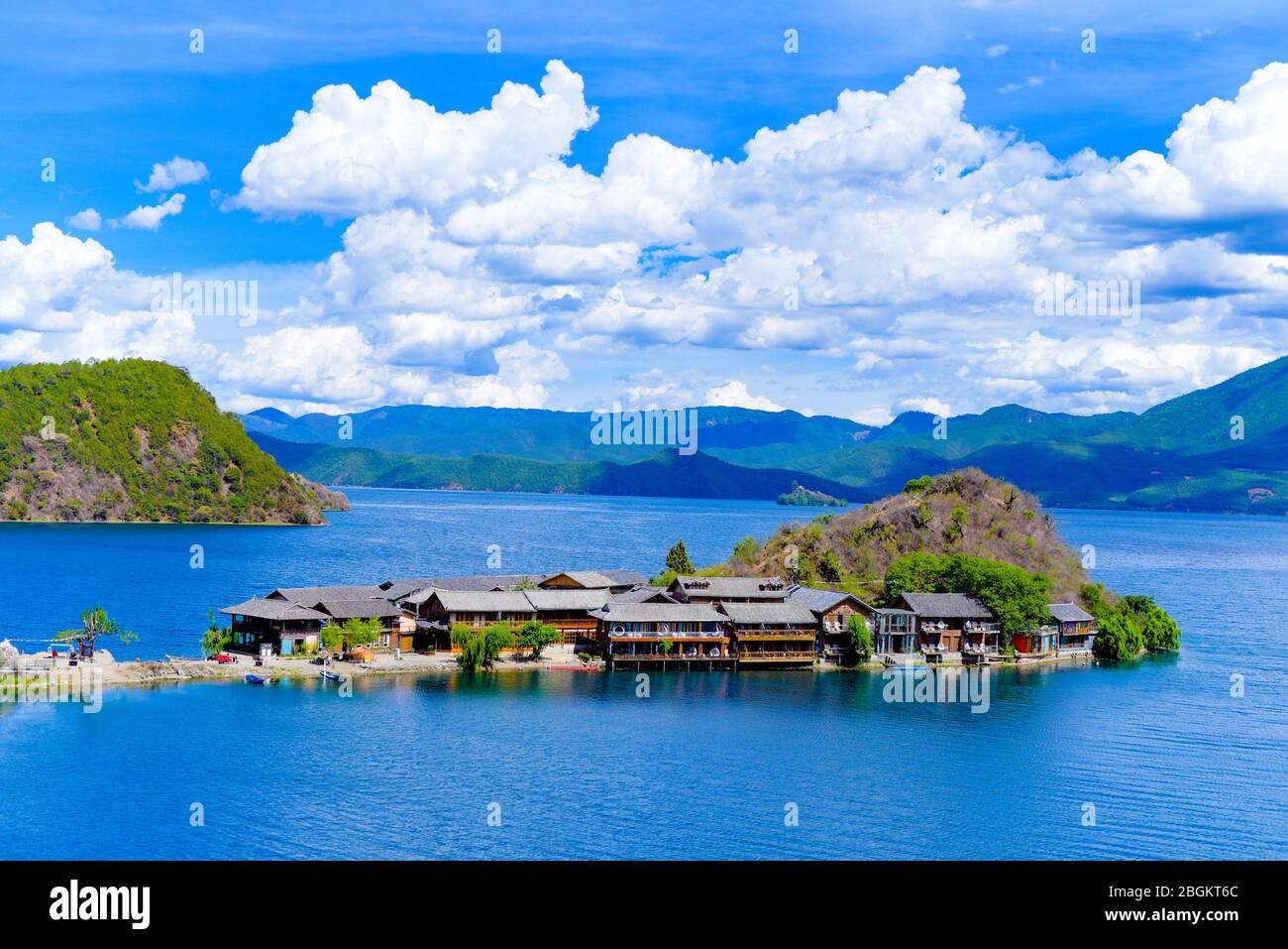 An aerial view of surroundings including mountains and islands beside ...