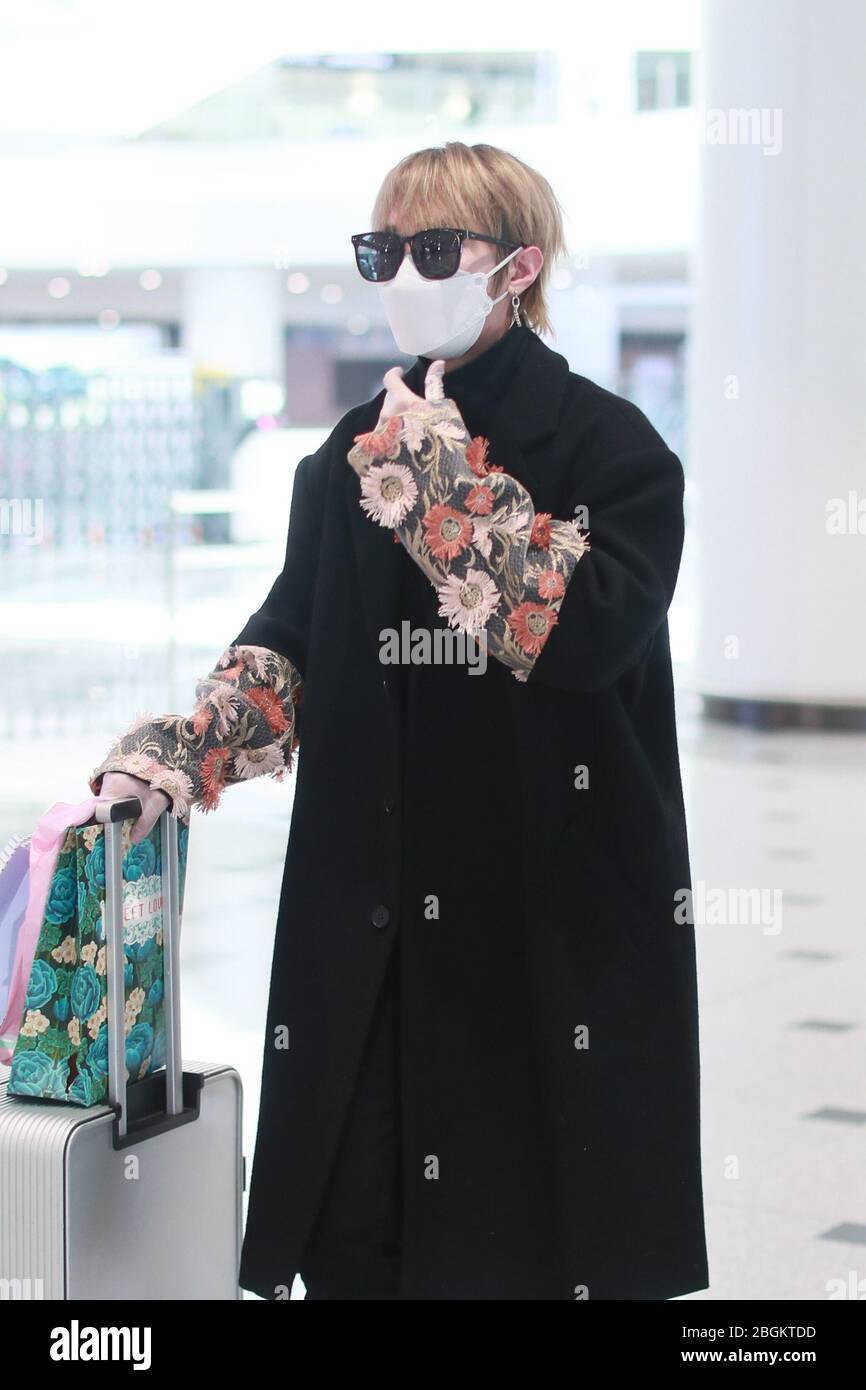 Liu Ye of Chinese idol boy band R1SE arrives at a Beijing airport after ...
