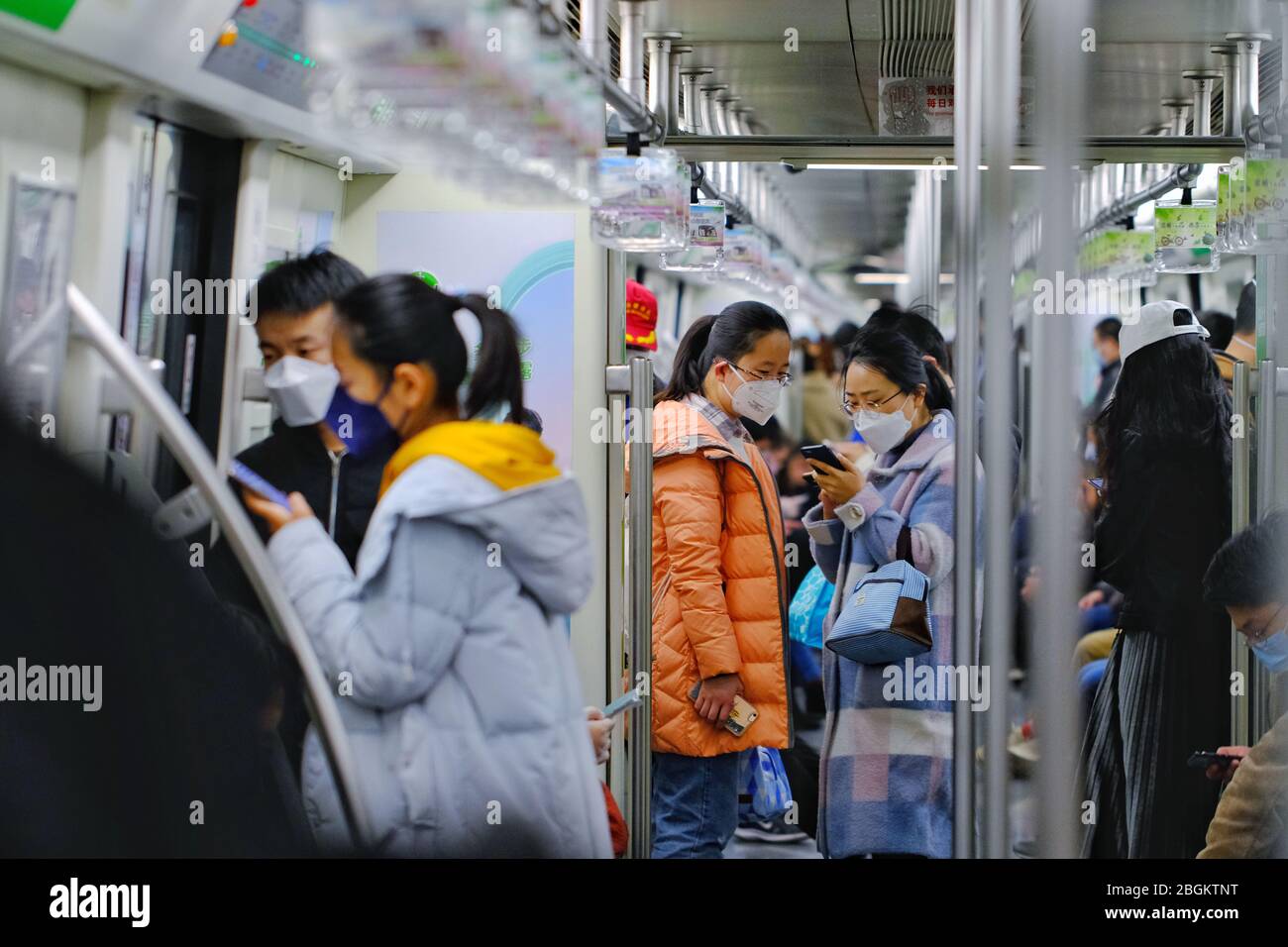 Crowd of people take subway to go home after whole-day work during ...