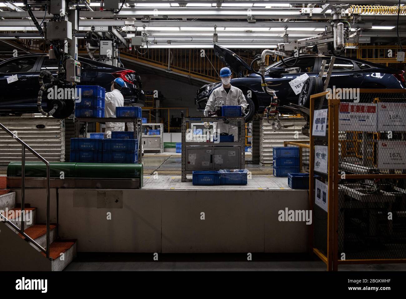 Staff of a local factory owned by Honda Motor Company, a Japanese ...