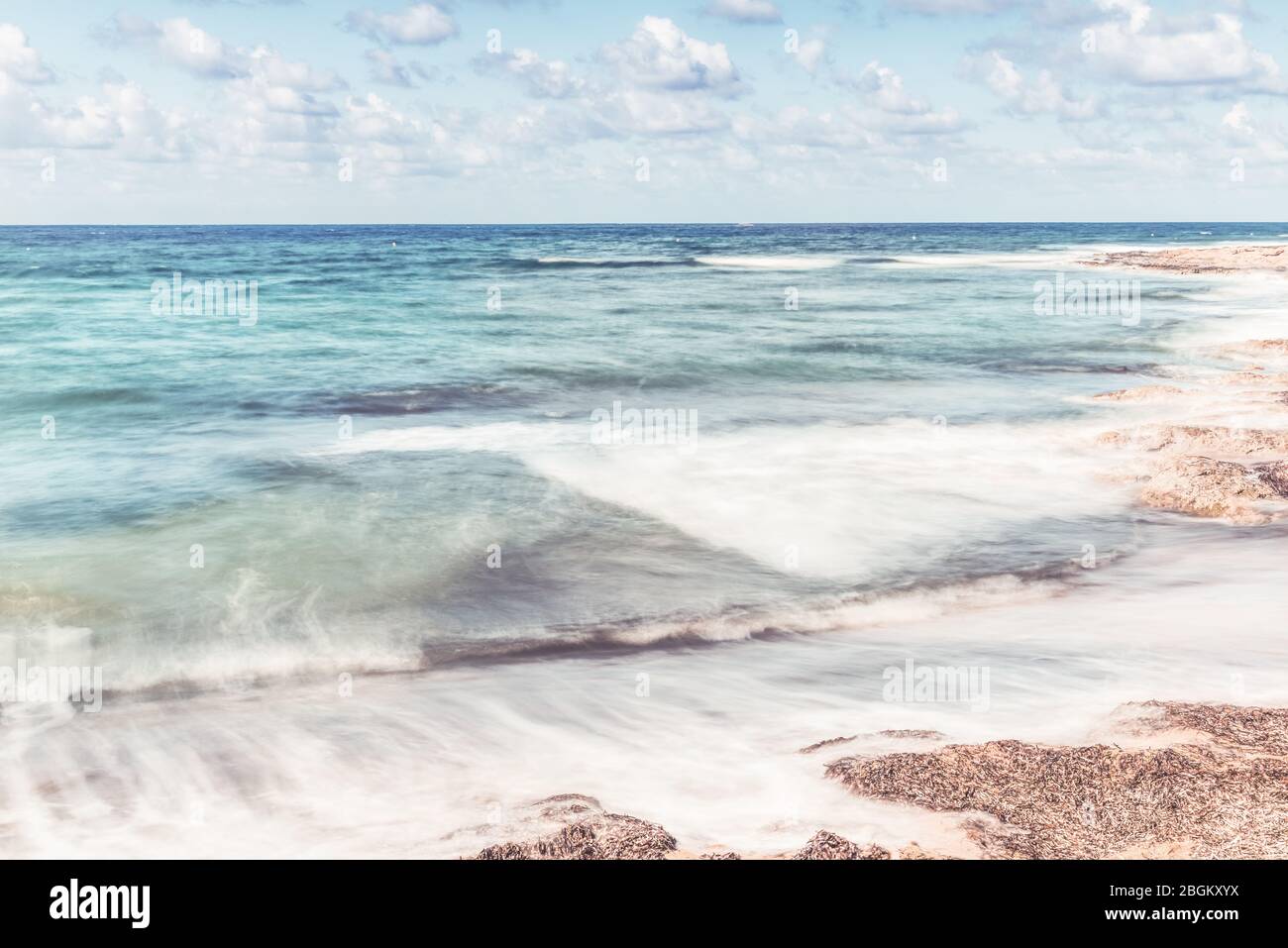 A fantastic stunning colorful landscape, a blue sea shore, the coast of ...