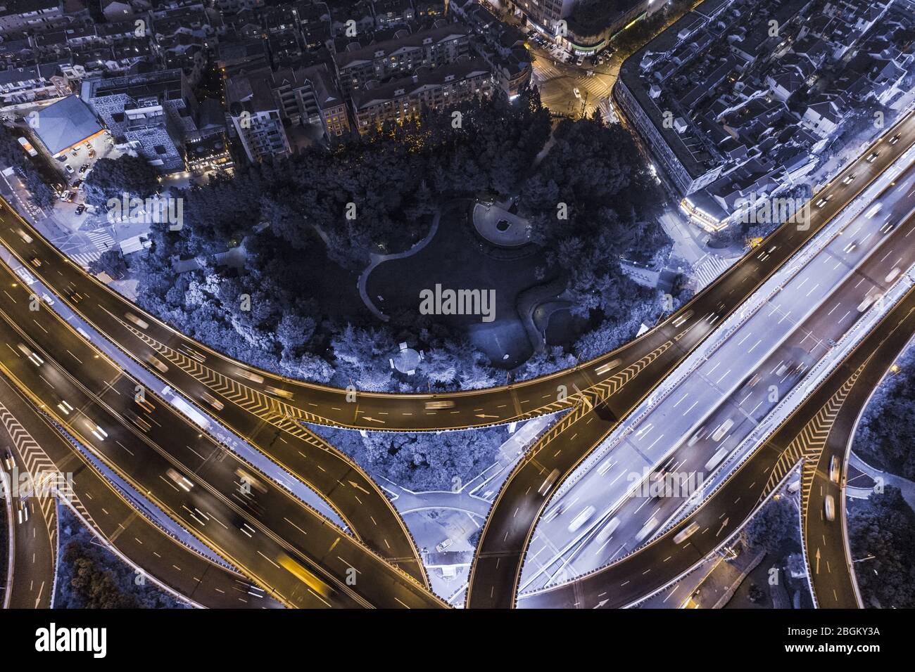 aerial view of highway interchange at night Stock Photo - Alamy