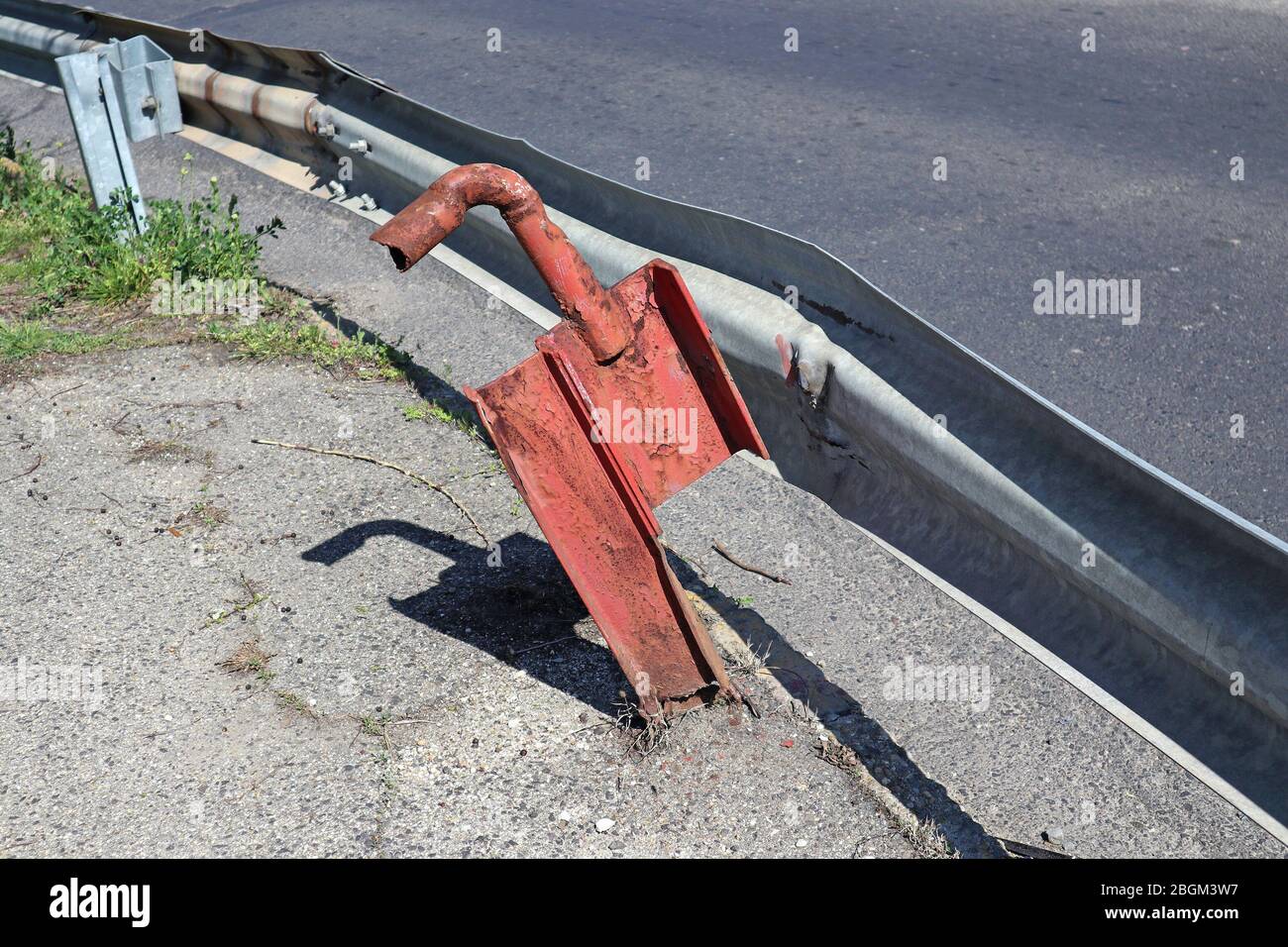 Damaged guard rail next to the road Stock Photo - Alamy