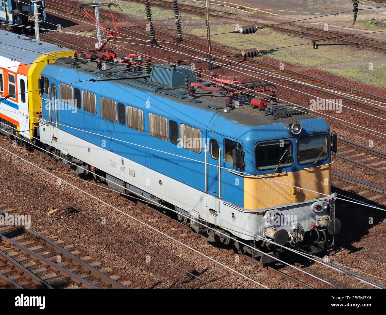 Blue electric train engine view from the bridge Stock Photo - Alamy