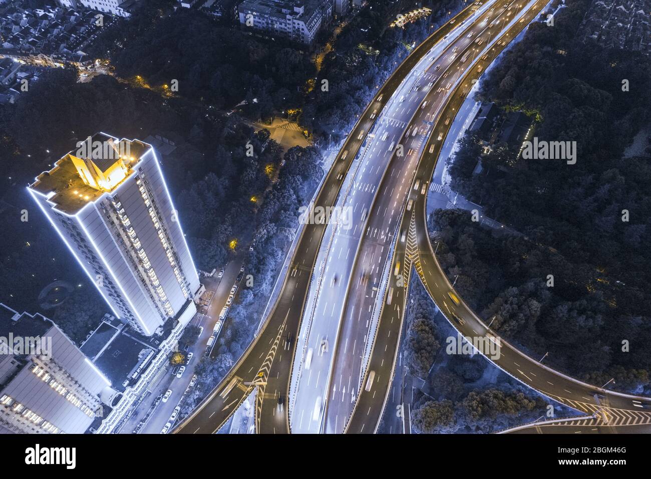 aerial view of highway interchange at night Stock Photo - Alamy