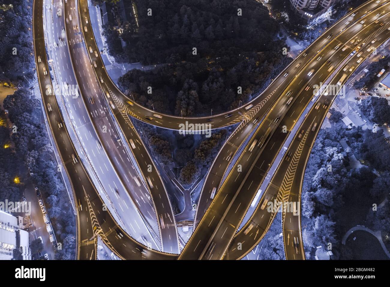 aerial view of highway interchange at night Stock Photo - Alamy