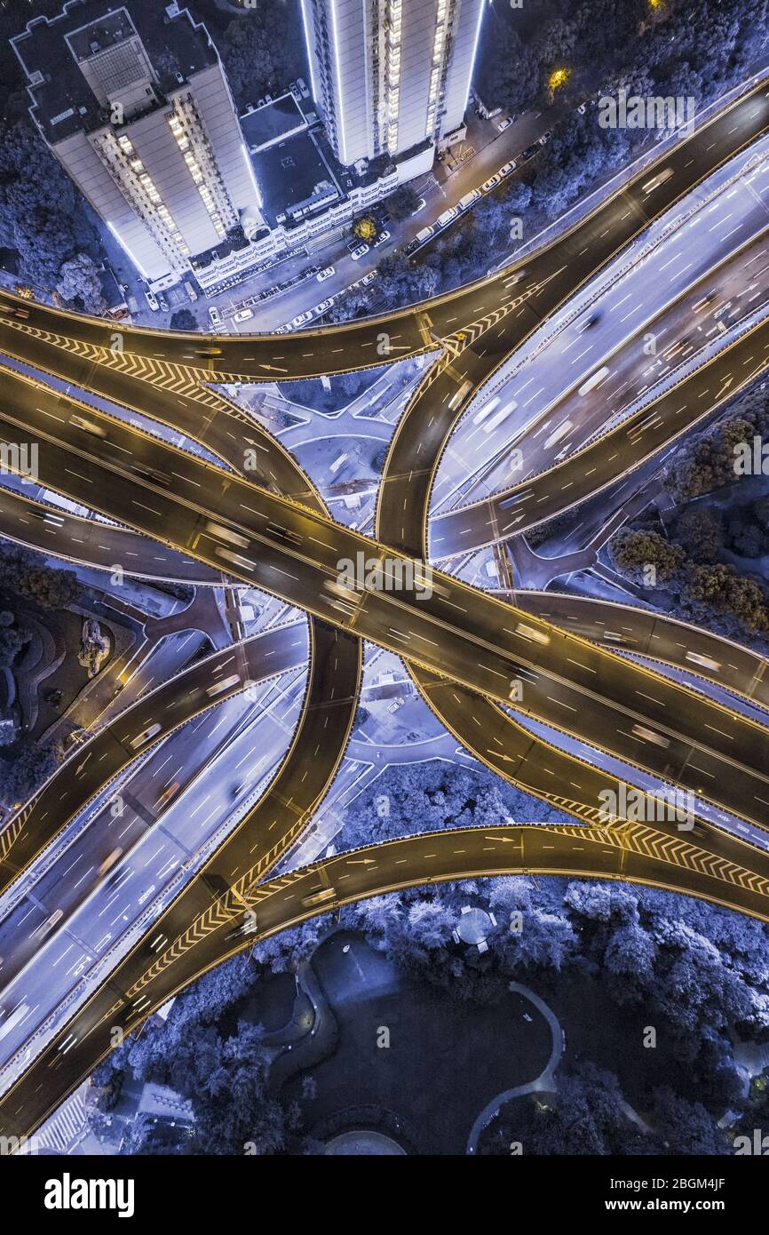 aerial view of highway interchange at night Stock Photo - Alamy